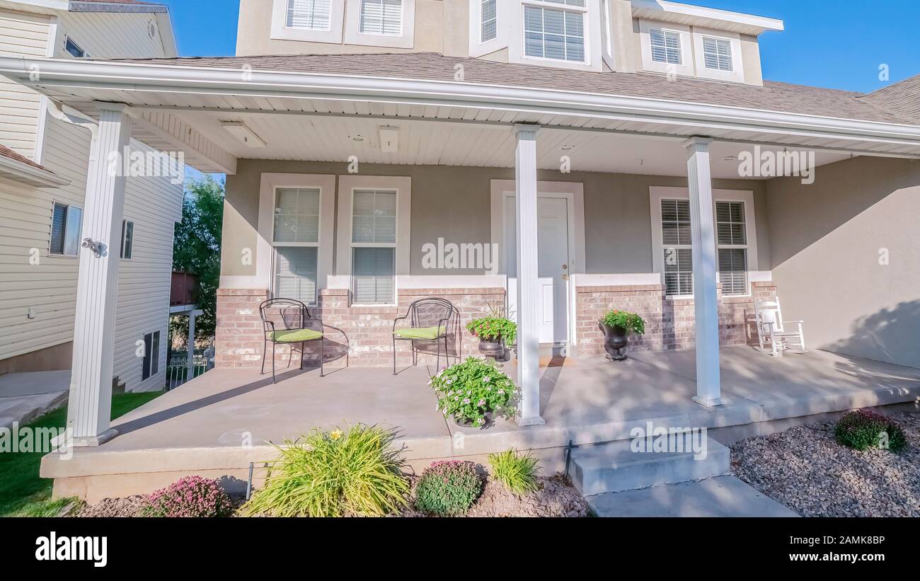 Panorama Modern urban house with covered front veranda Stock Photo - Alamy