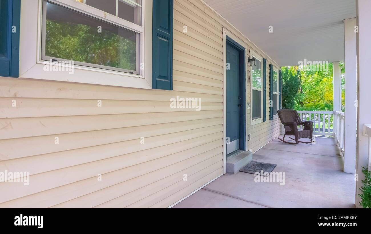 Panorama frame Long covered veranda in front of a timber house Stock ...