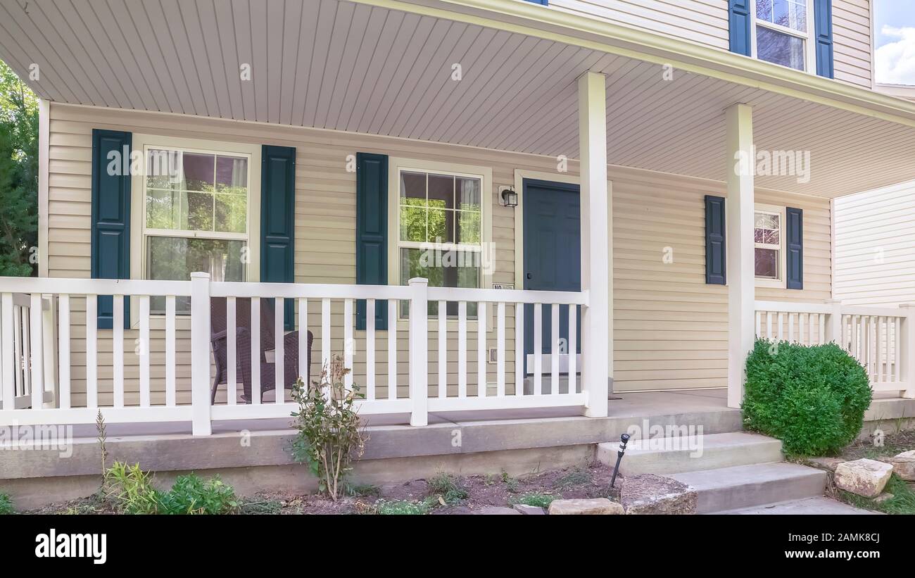 Panorama frame white double storey house with large porch Stock Photo ...
