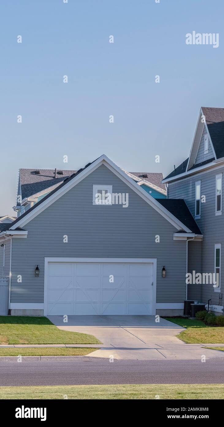 Vertical frame Street view of a modern residential house Stock Photo ...