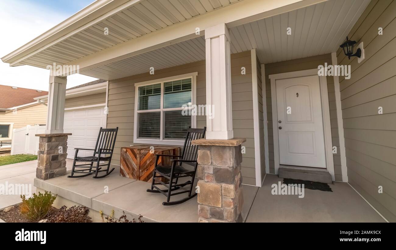 Panorama frame Covered front porch with rocking chairs day light Stock ...