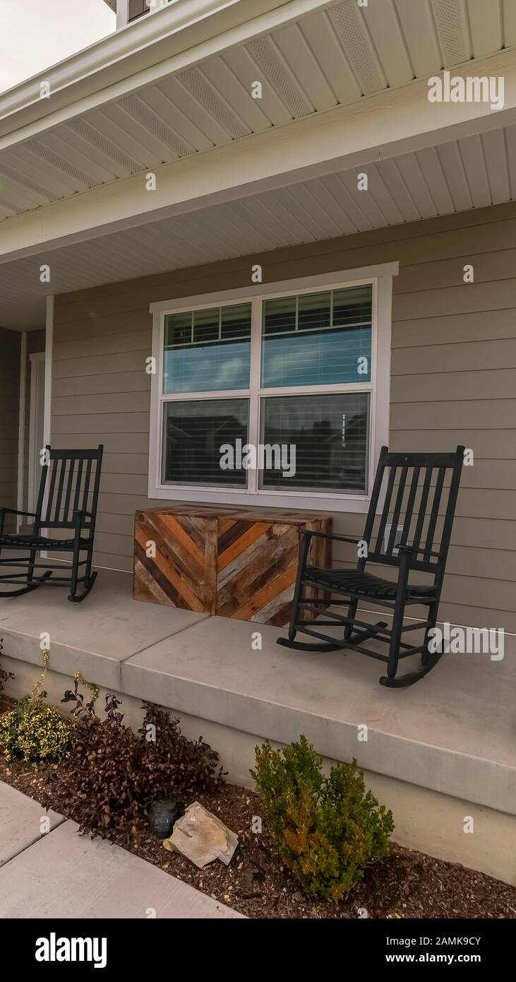 Image of two rocking chairs hi-res stock photography and images - Alamy