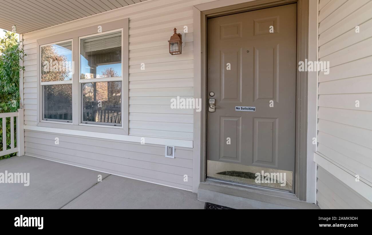 Panorama frame Covered front porch with grey and white decor Stock ...
