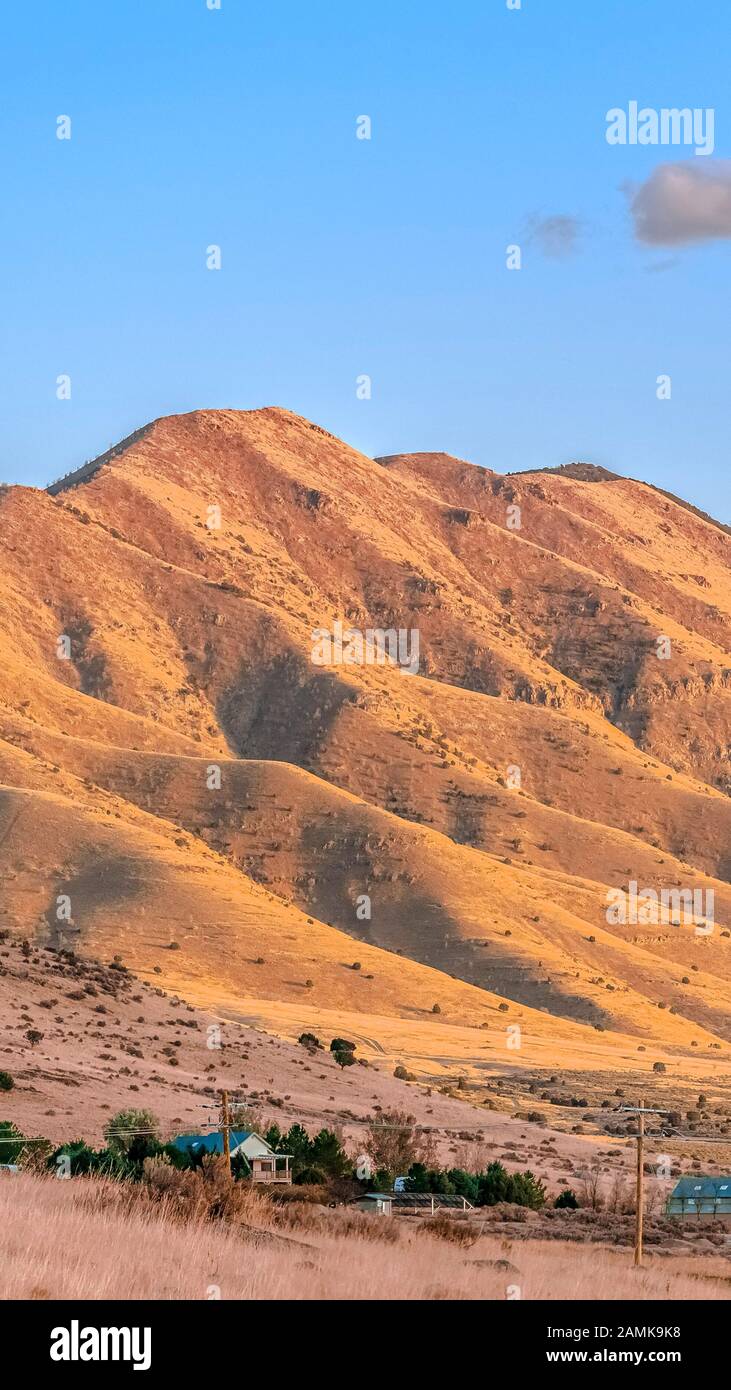 Vertical Mountains along the Utah Valley in golden light Stock Photo ...