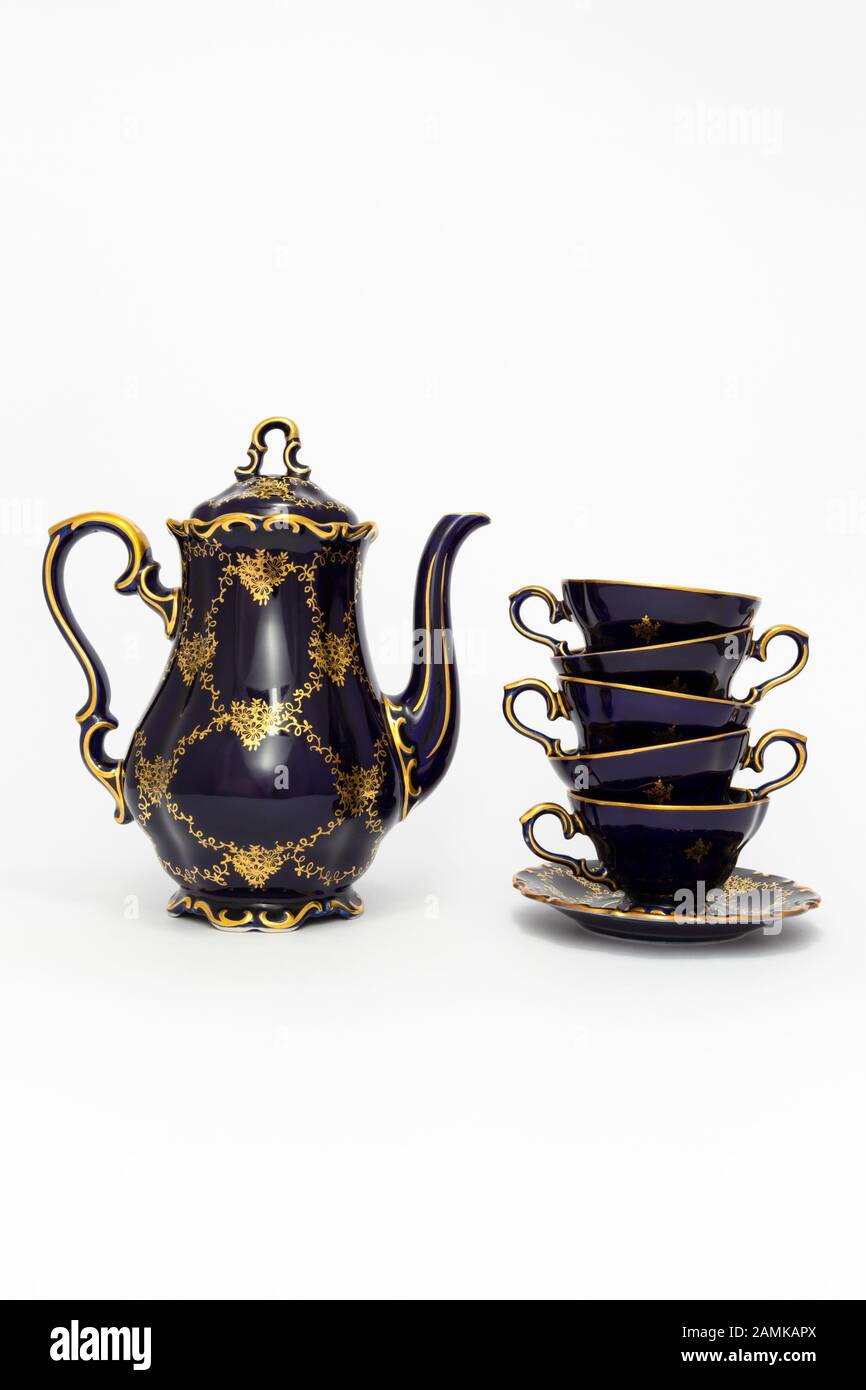 Closeup of a beautiful cobalt blue colored vintage porcelain tea set ...