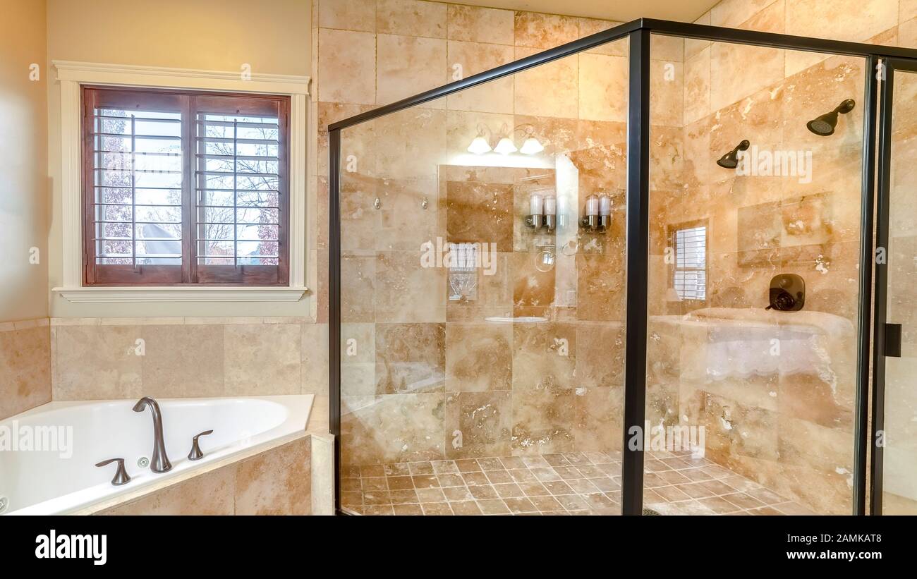 Panorama Modern luxury bathroom with glass shower cubicle Stock Photo ...