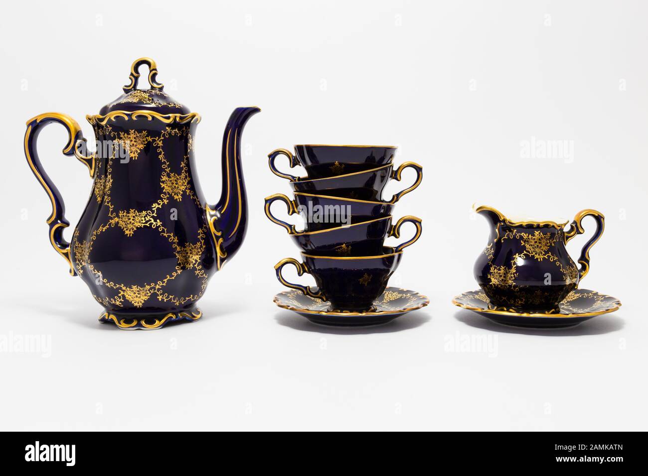 Closeup of a beautiful cobalt blue colored vintage porcelain tea set ...