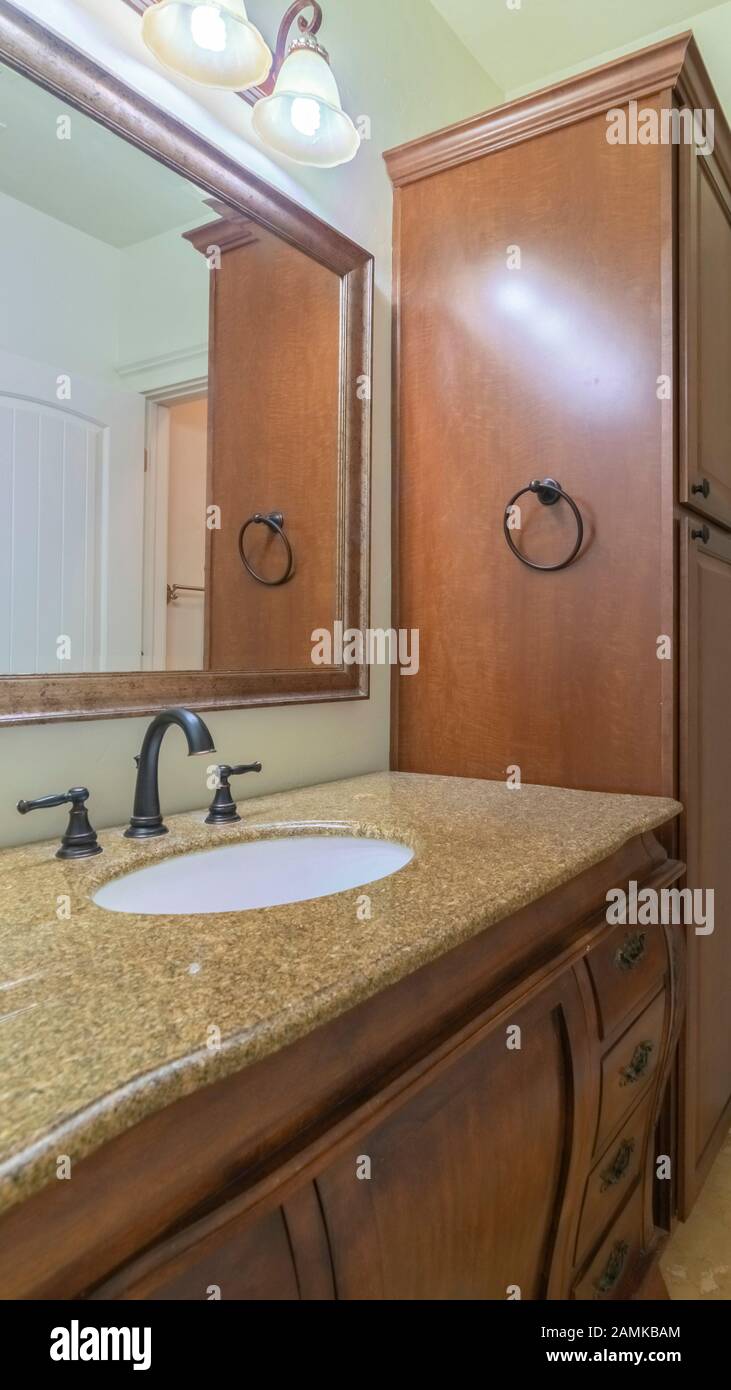 Vertical frame Modern luxury bathroom with marble topped vanity Stock ...