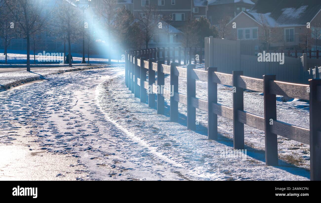 Panorama frame Ray of sunlight lighting up a wood roadside fence Stock ...