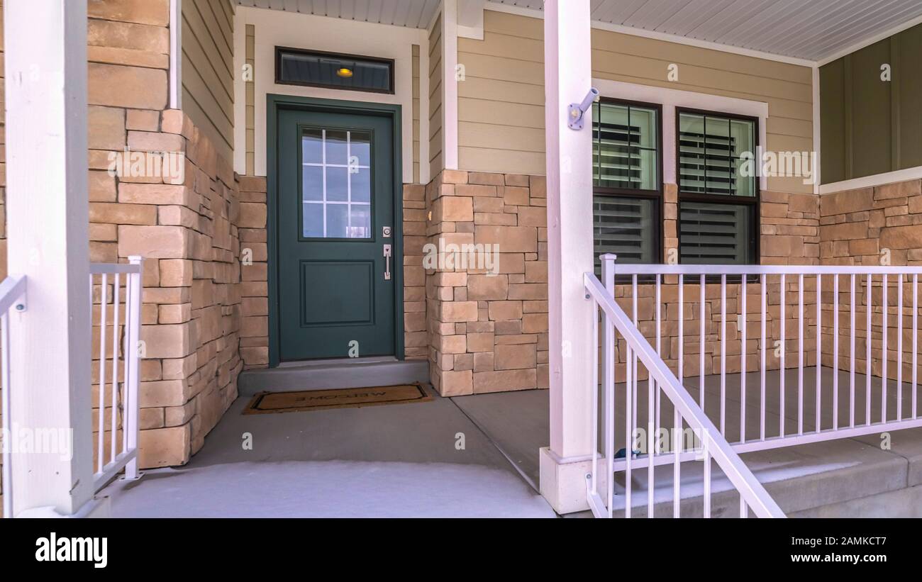 Panorama Snow covered front steps and porch day light Stock Photo - Alamy