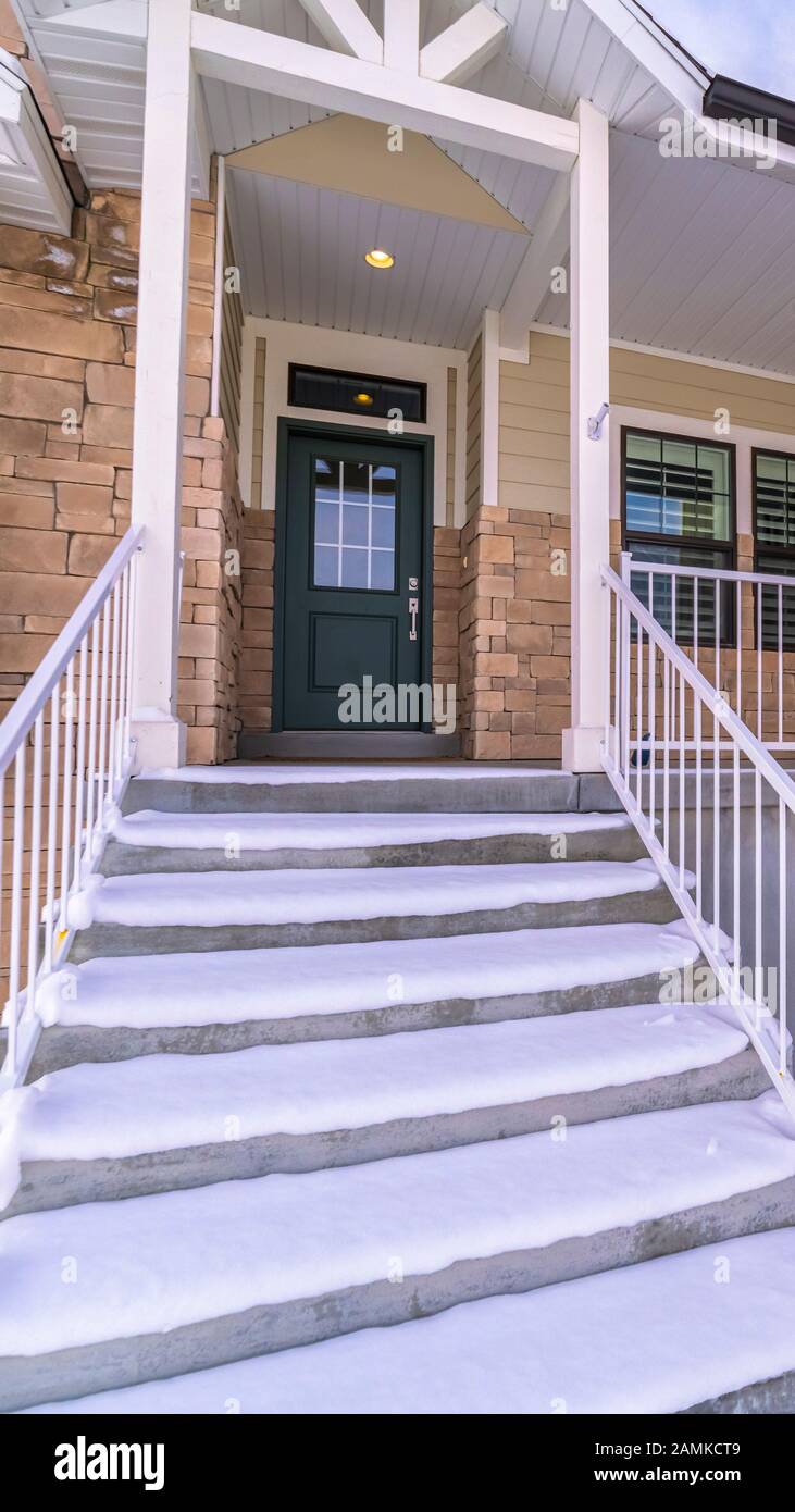 Vertical frame Flight of steps covered in white snow Stock Photo - Alamy