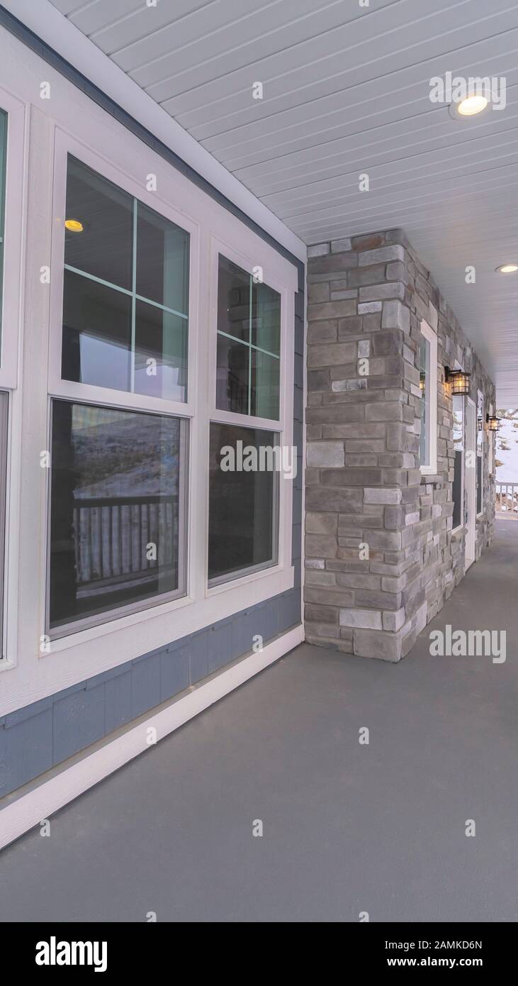 Vertical frame Long covered patio with view windows day light Stock ...