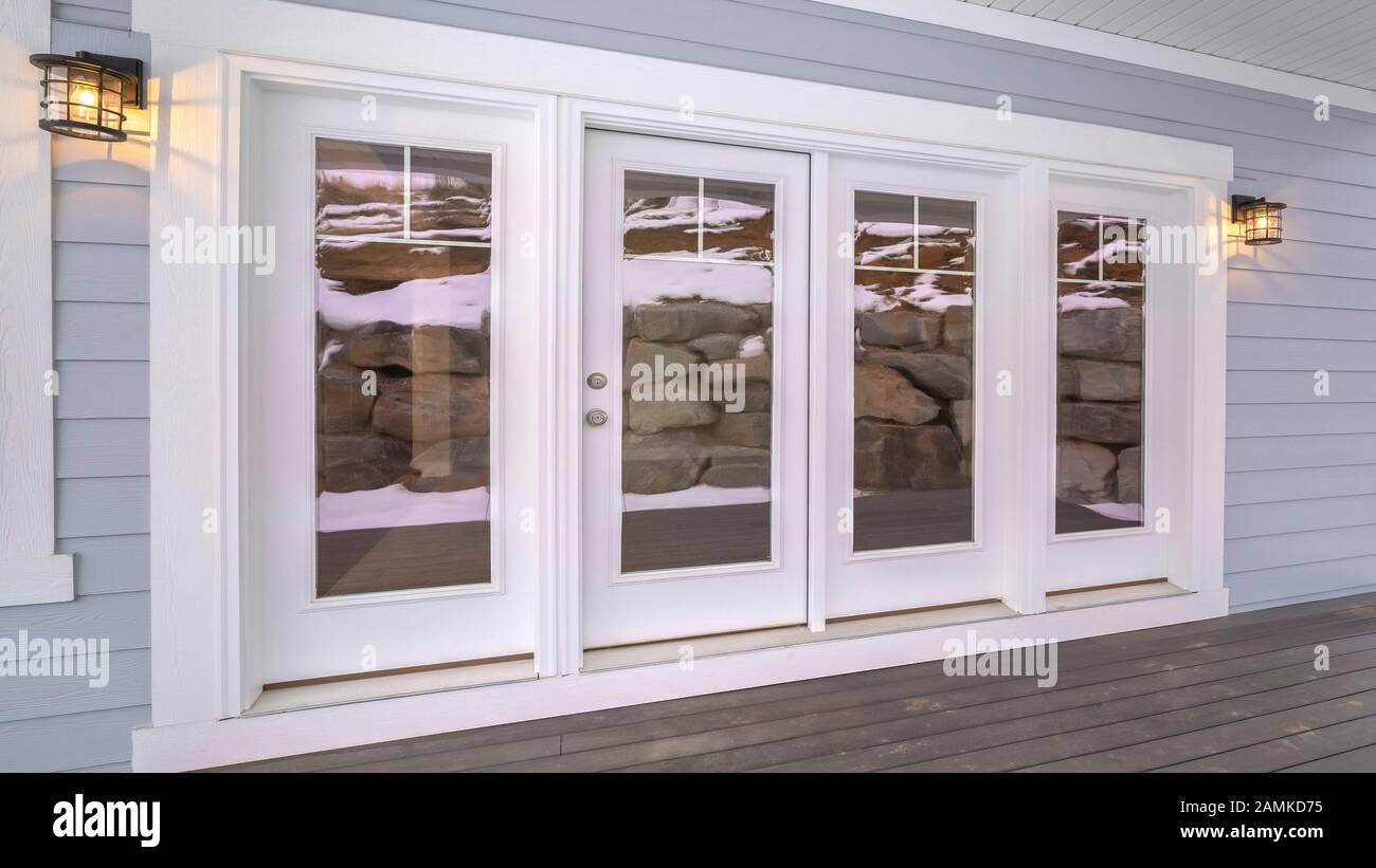 Panorama frame Wooden deck of a covered porch with large windows Stock ...