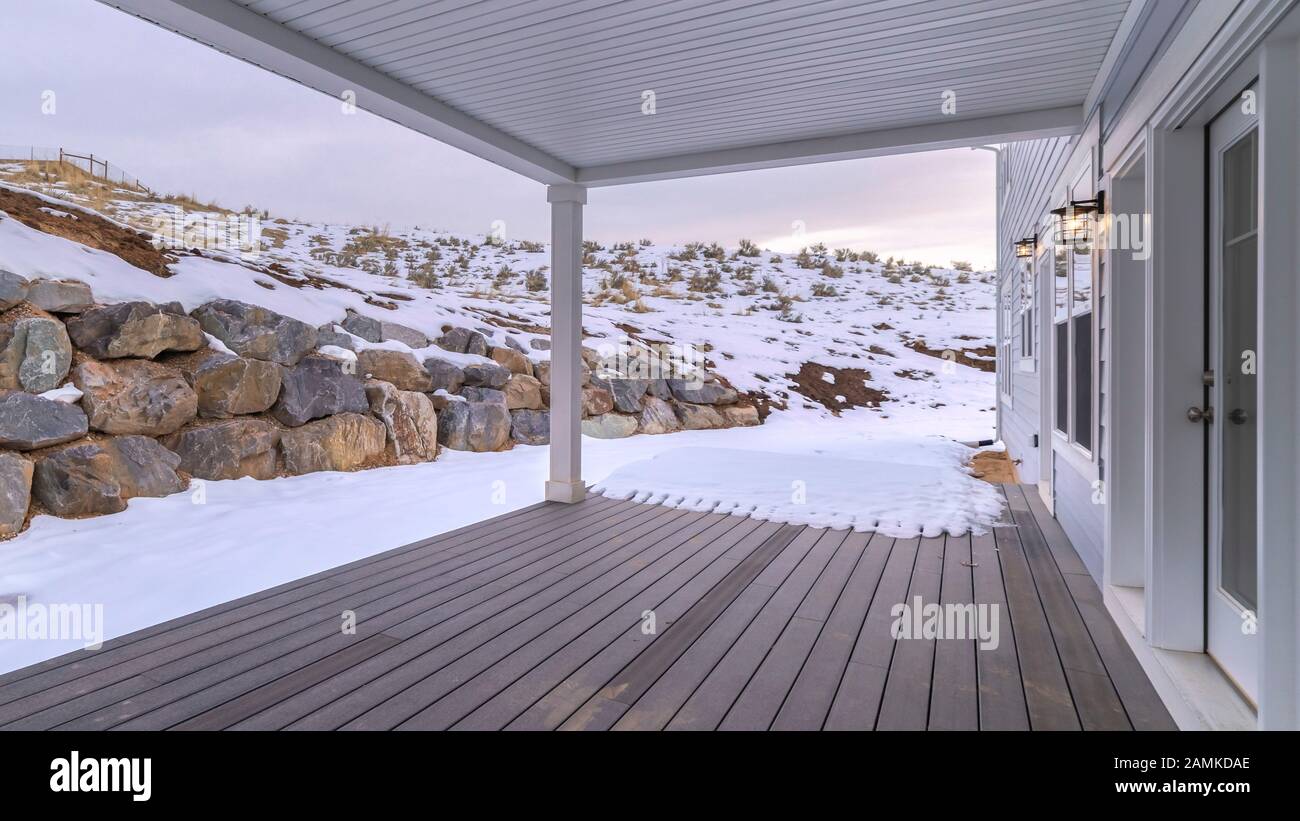 Panorama frame Large covered porch with wooden deck day light Stock ...