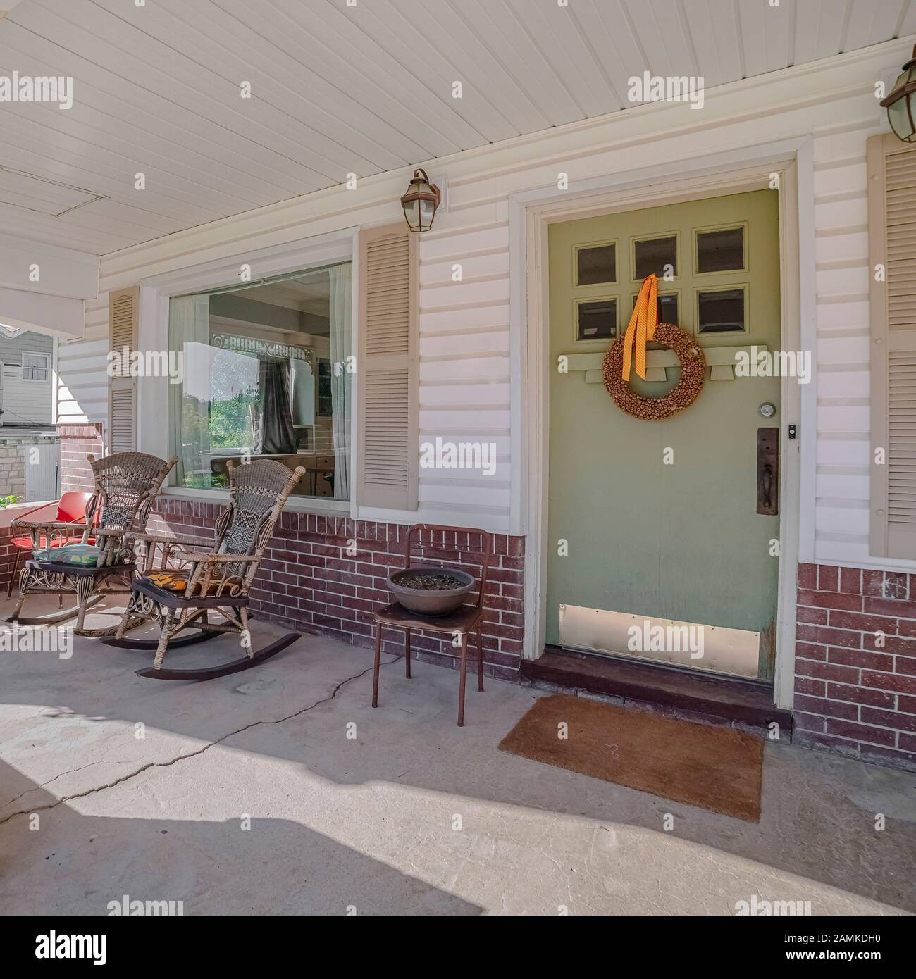 Square frame Covered front porch with rocking chairs day light Stock ...