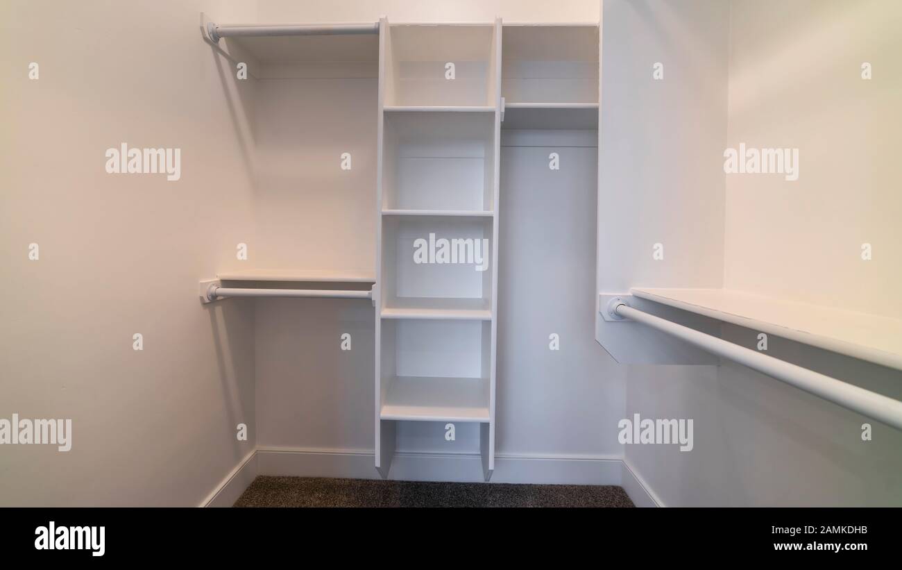 Panorama Fitted interior of a walk-in wardrobe bright interior Stock ...