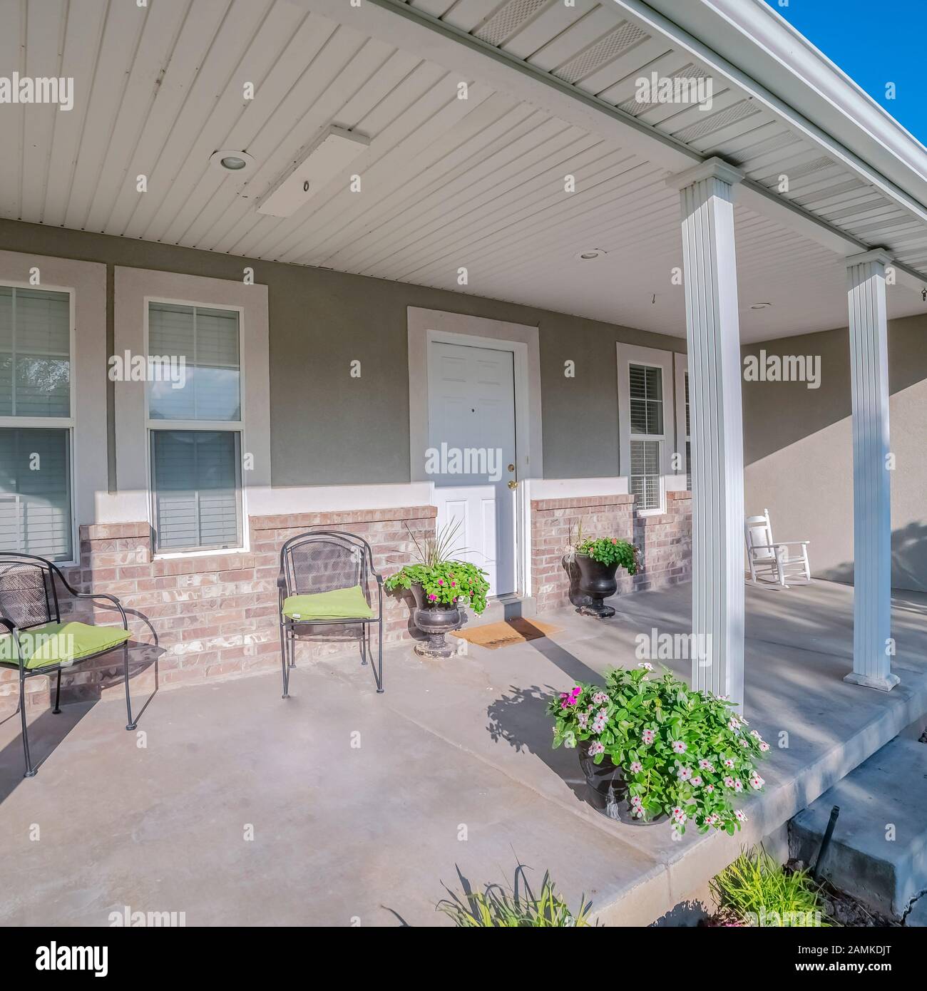 Square Covered porch at the front of an urban house Stock Photo - Alamy