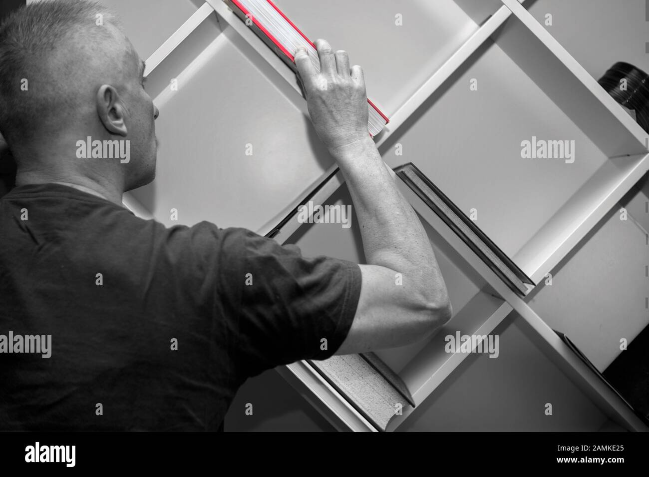 Person picking from shelf hi-res stock photography and images - Alamy