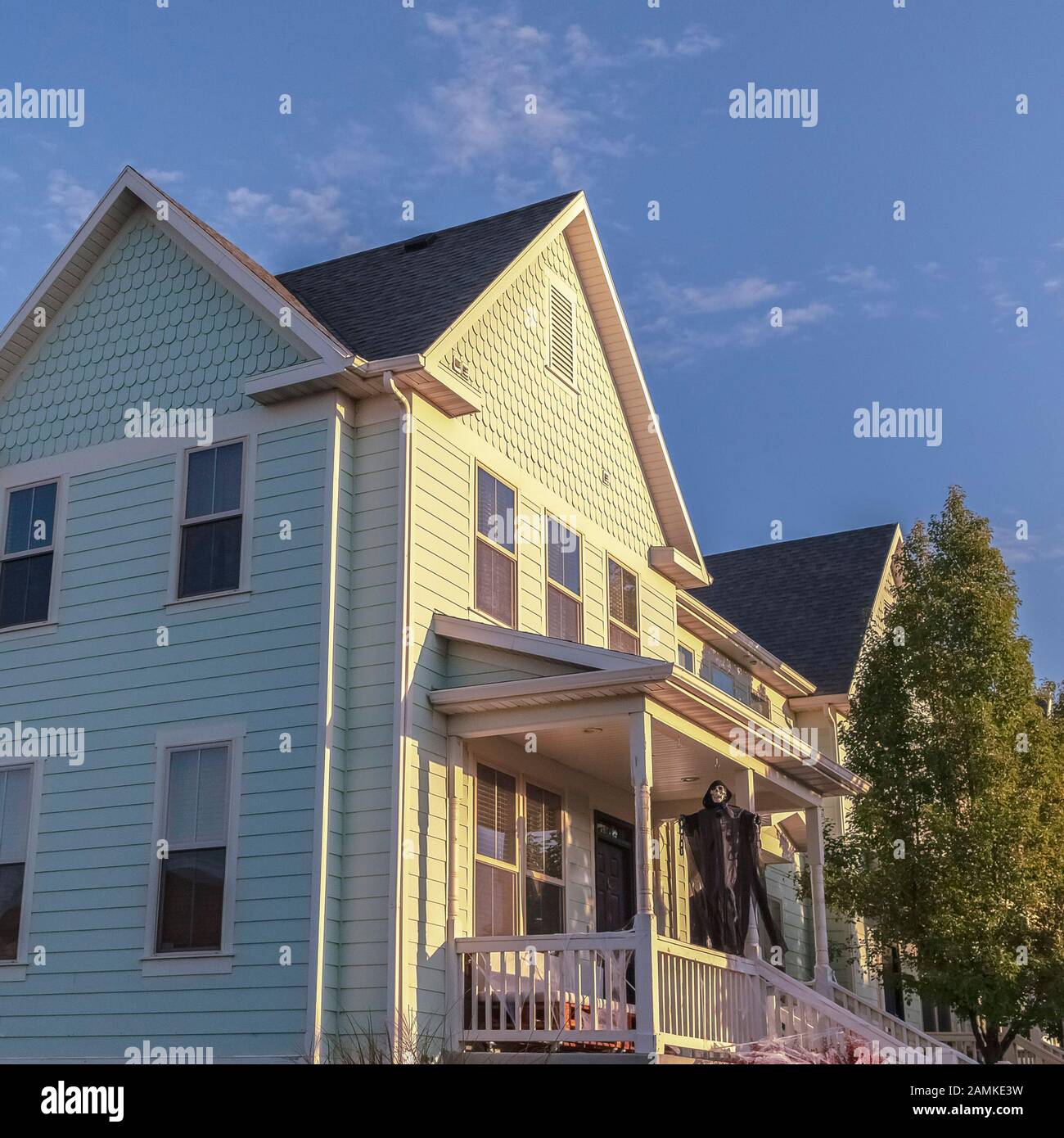 Square Traditional American house from low angle day light Stock Photo ...