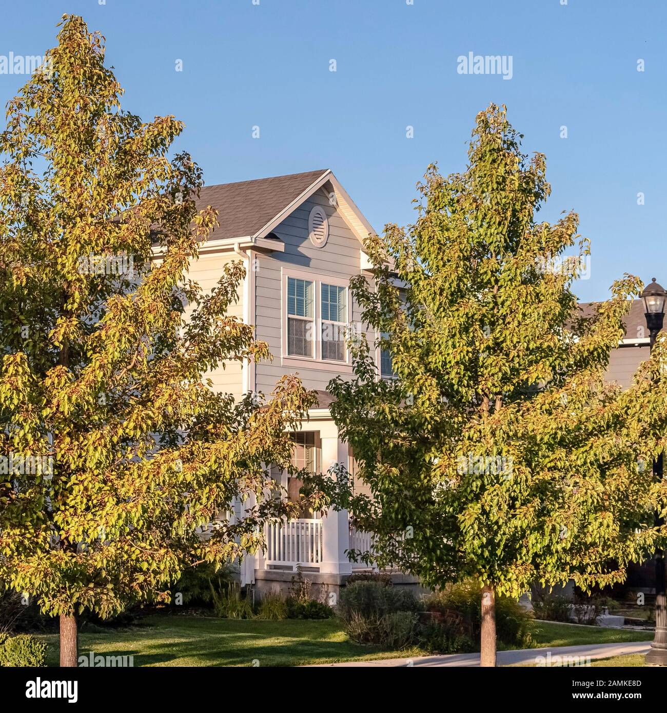 Square Row of houses on an urban street Stock Photo - Alamy