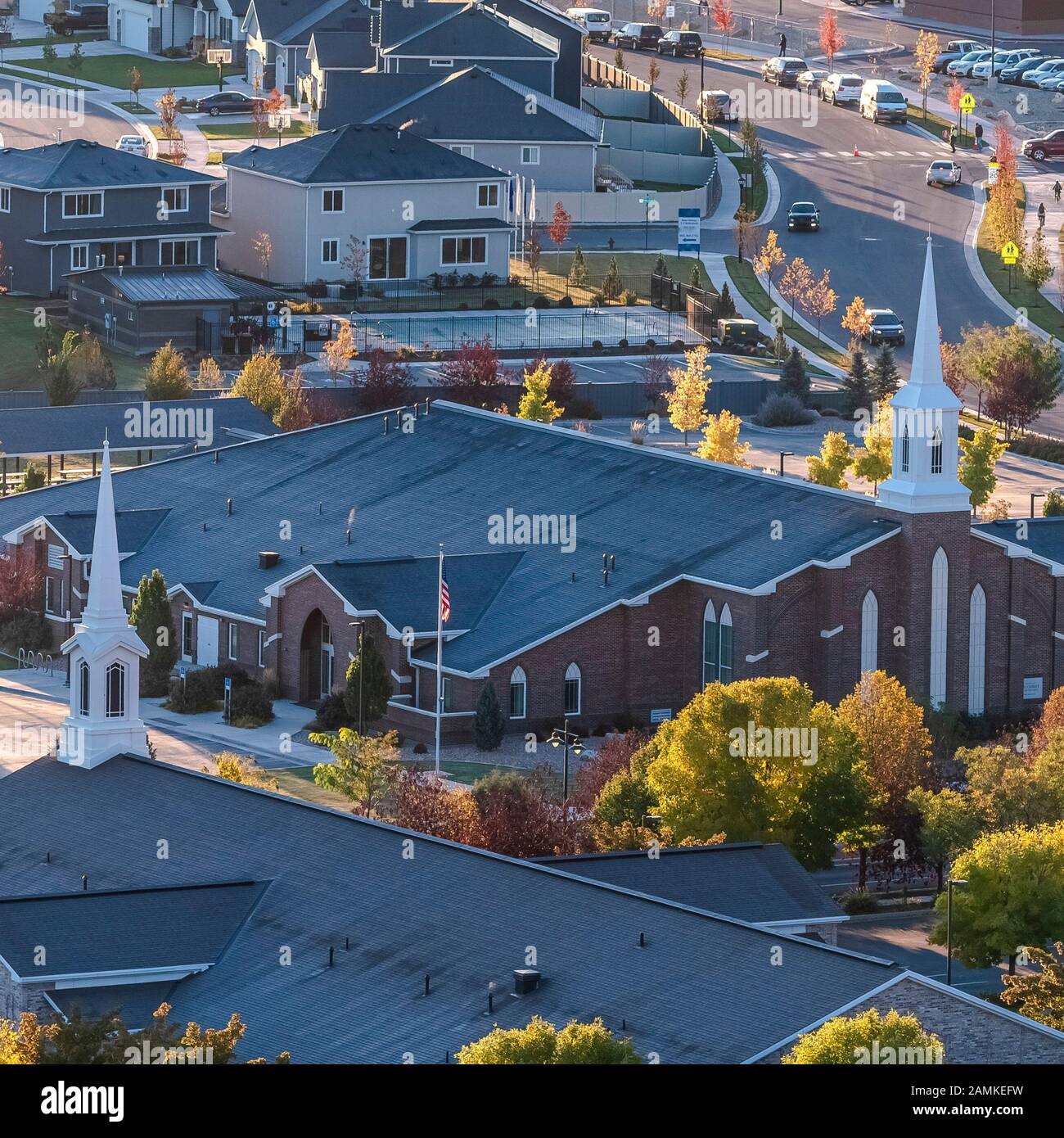 Square Large church complex in a modern housing estate Stock Photo - Alamy
