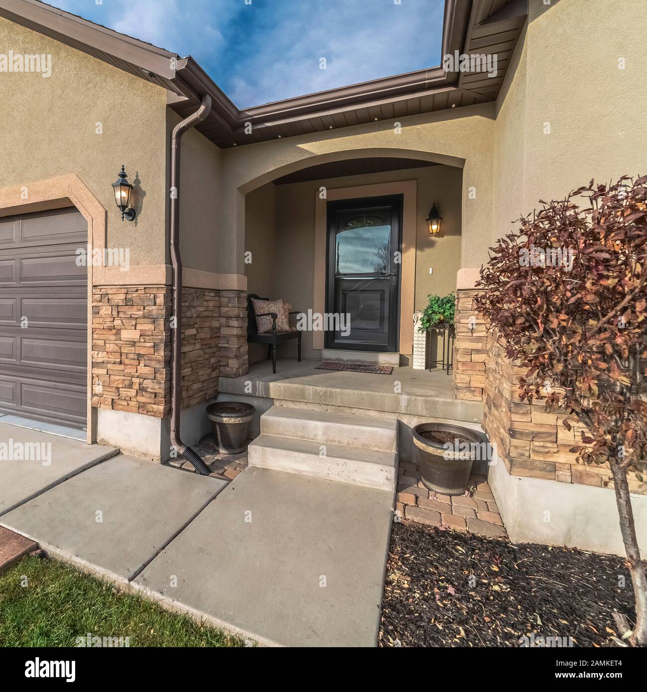 Square frame Covered house entrance with glass door day light Stock ...