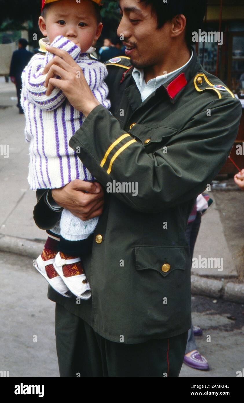 Child and soldier china hi-res stock photography and images - Alamy