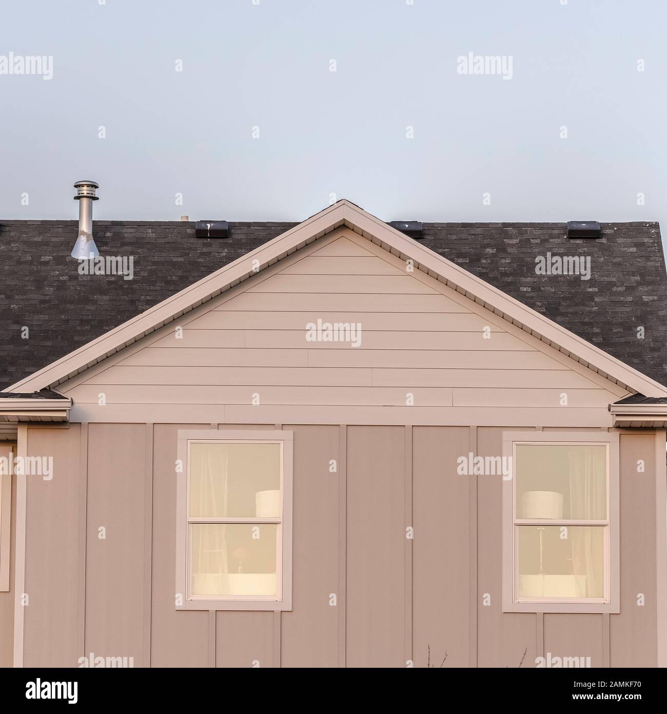 Square Simple American house with gable roof day light Stock Photo - Alamy
