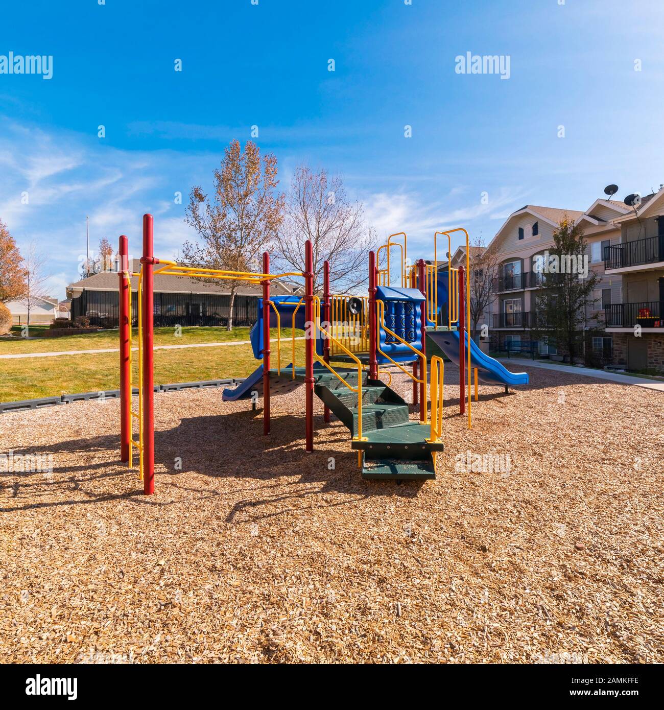 Square Small kids playground in an urban park Stock Photo - Alamy
