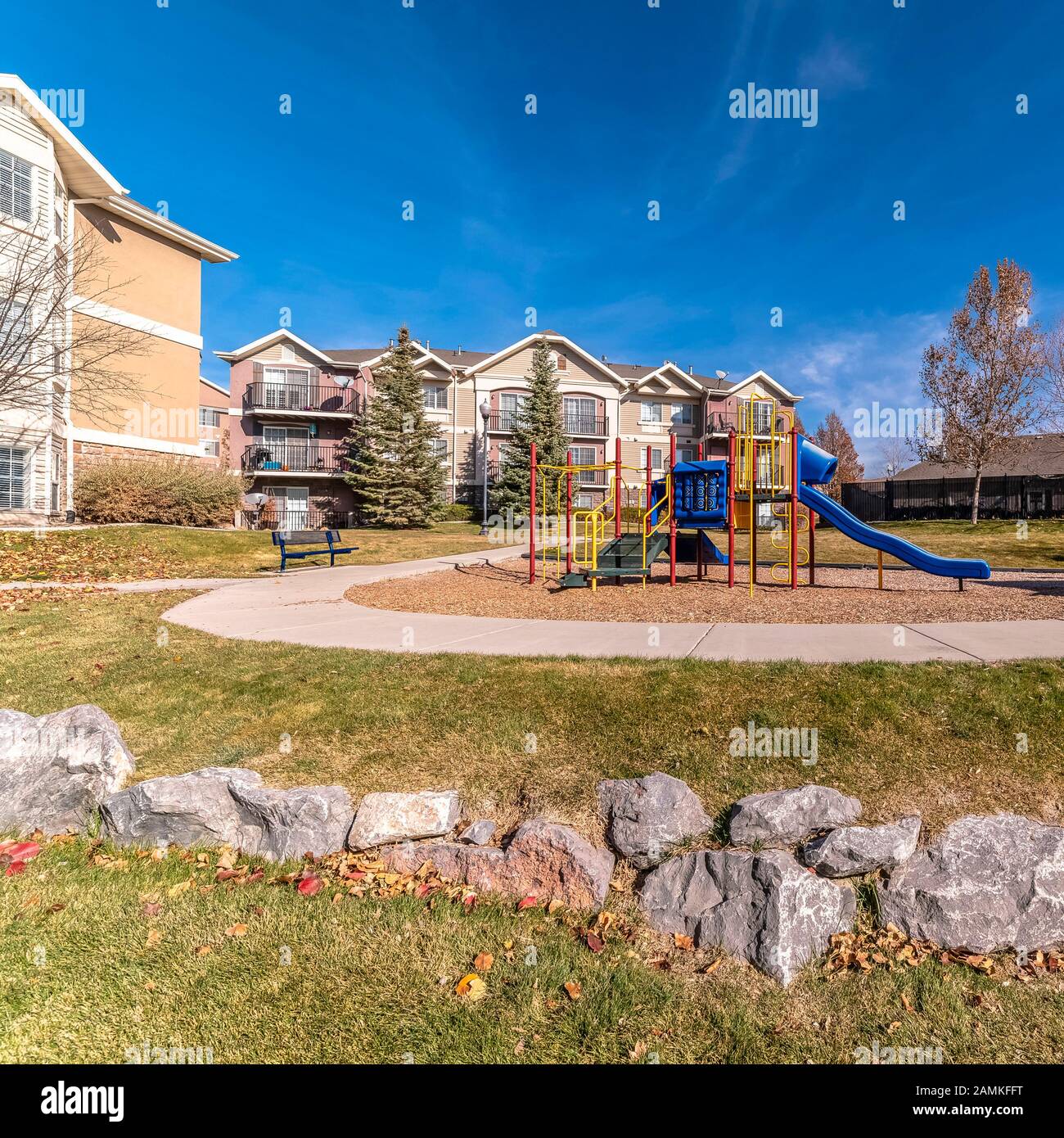 Square frame Kids playground in an urban park day light Stock Photo - Alamy