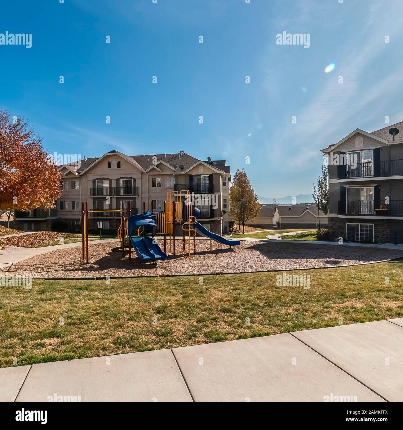 Square Winding paved footpath through a greenbelt area Stock Photo - Alamy