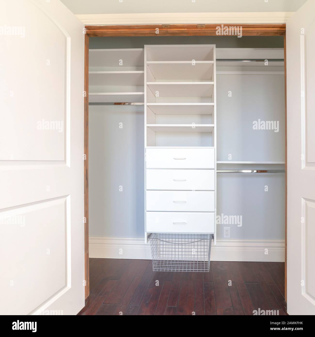 Square Interior of an empty walk-in closet in a new house Stock Photo ...