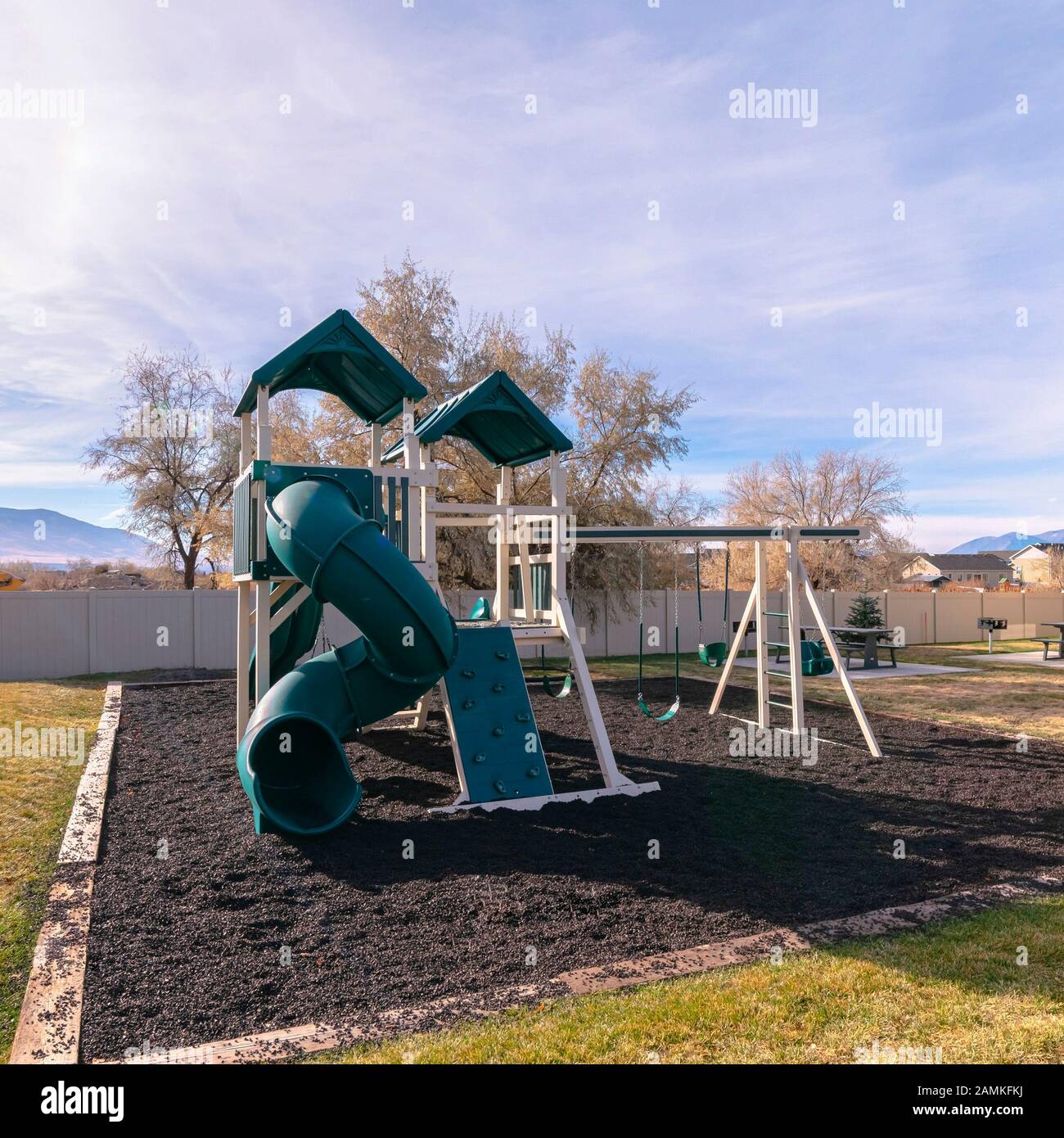 Square Kids playground in a walled park or estate Stock Photo - Alamy