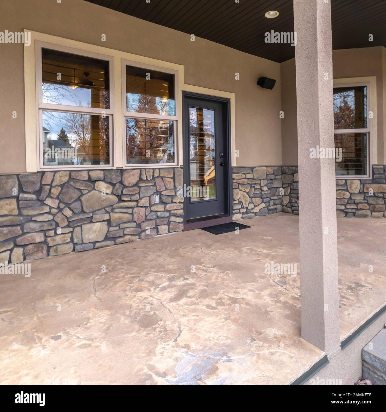 Square frame Modern house with feature stone wall day light Stock Photo ...