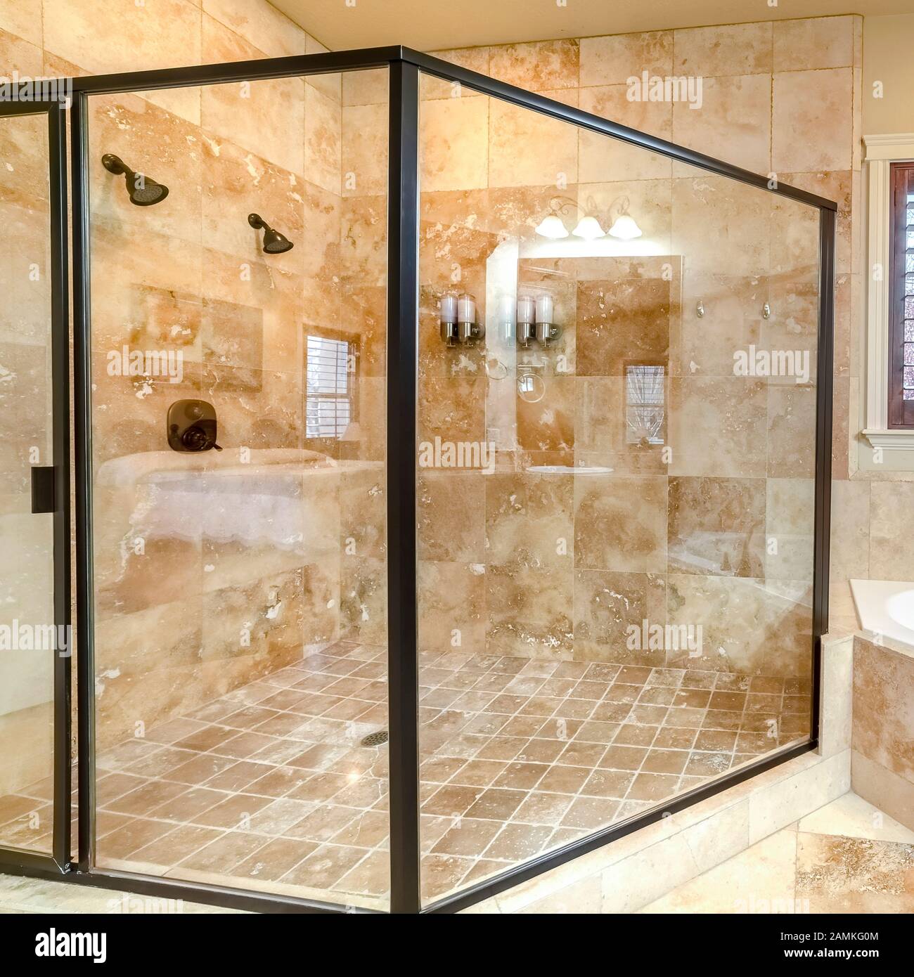 Square Modern luxury bathroom with glass shower cubicle Stock Photo - Alamy