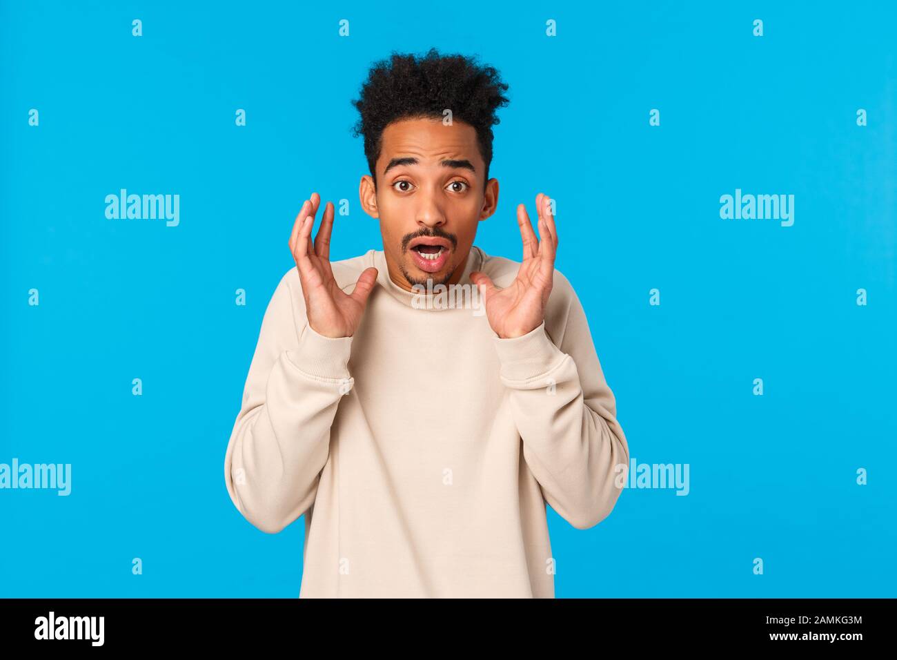 Man in panic telling something terrible, bad news. Alarmed, scared ...