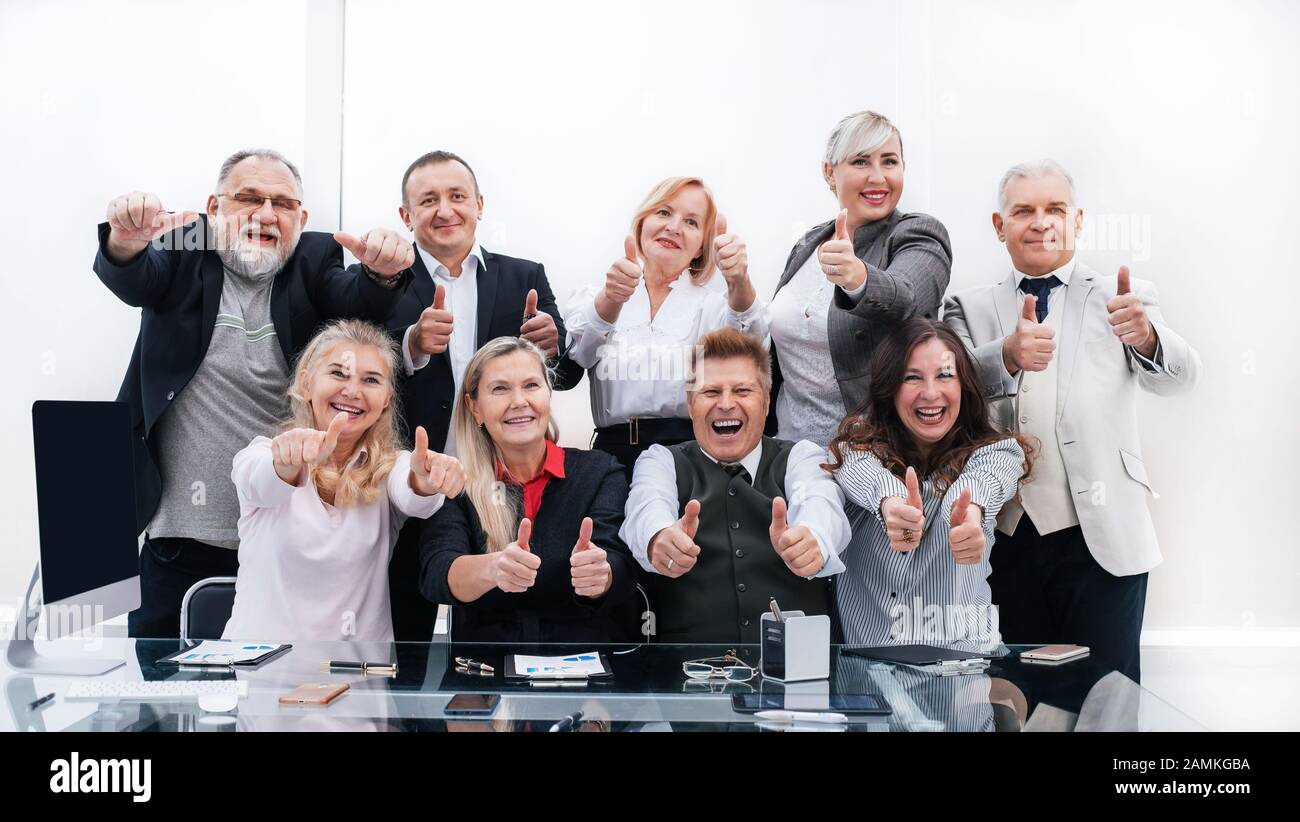 large group of happy employees showing their success Stock Photo - Alamy