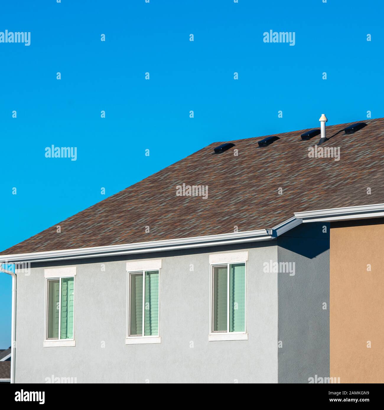 Square frame Upstairs windows in a double storey house Stock Photo - Alamy