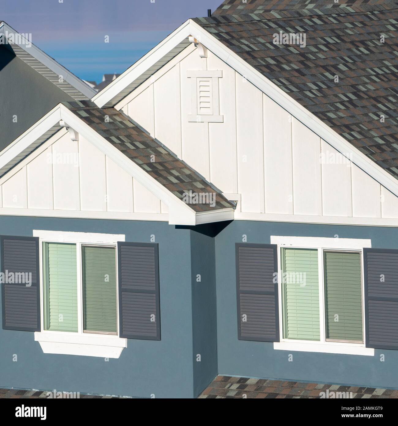 Square Grey and white house facade with shutters Stock Photo - Alamy