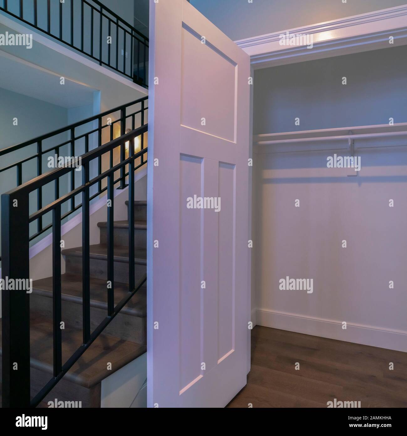 Square Open empty cupboard door with rails bright interior Stock Photo ...