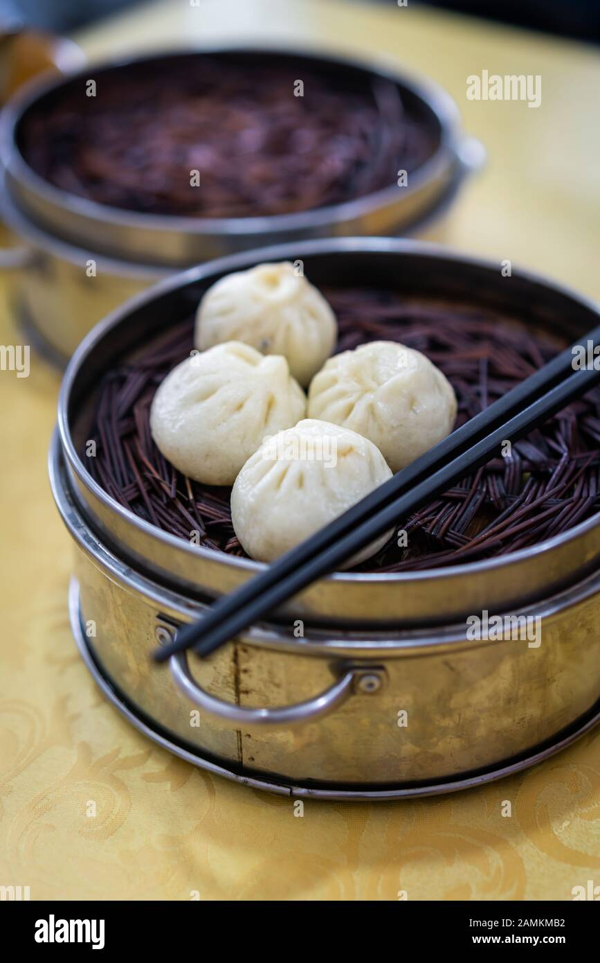 Delicious traditional chinese Baozi buns, steamed buns filled with ...