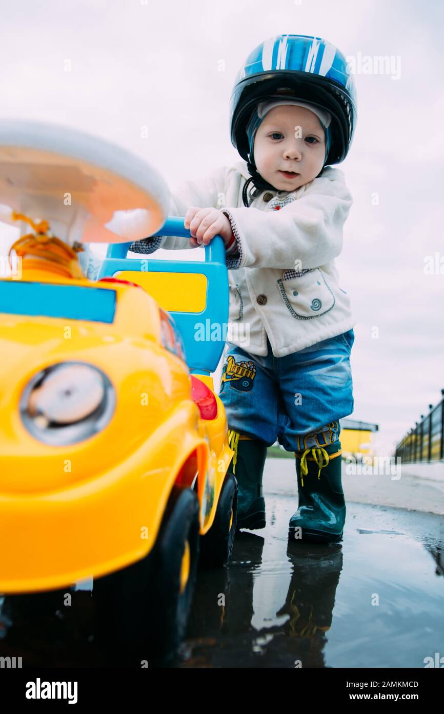 Child playing with small cars hi-res stock photography and images - Alamy