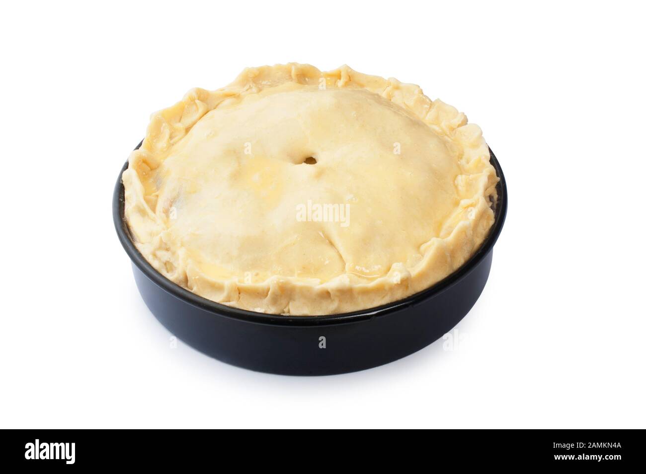 Studio shot of an uncooked pie cut out against a white background ...