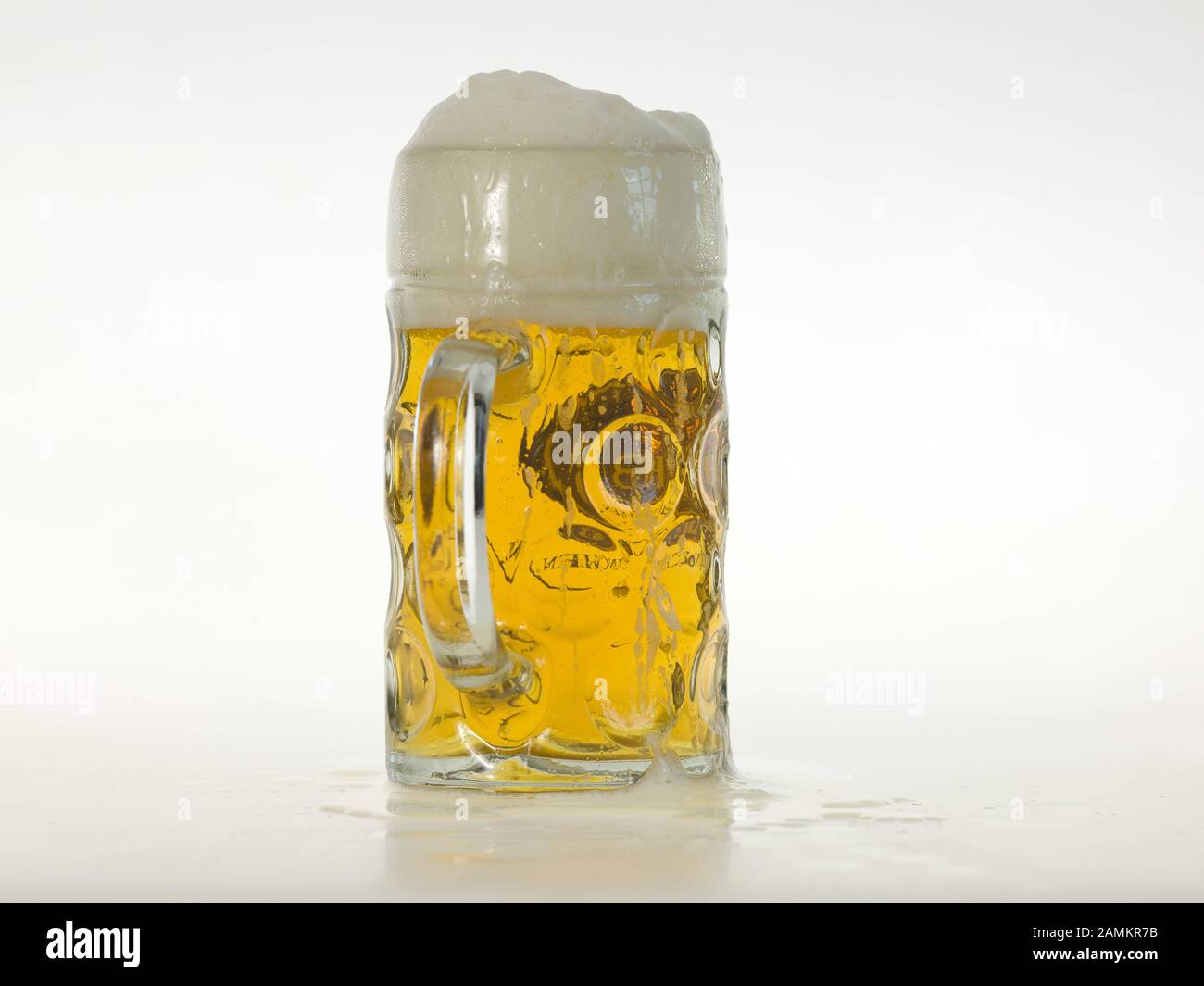 Masskrug filled with foam from Hofbräu Munich. [automated translation ...