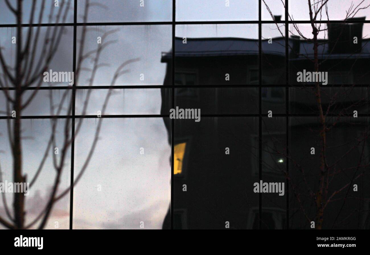 The glass facade of an office building in Arabella Park on the ...