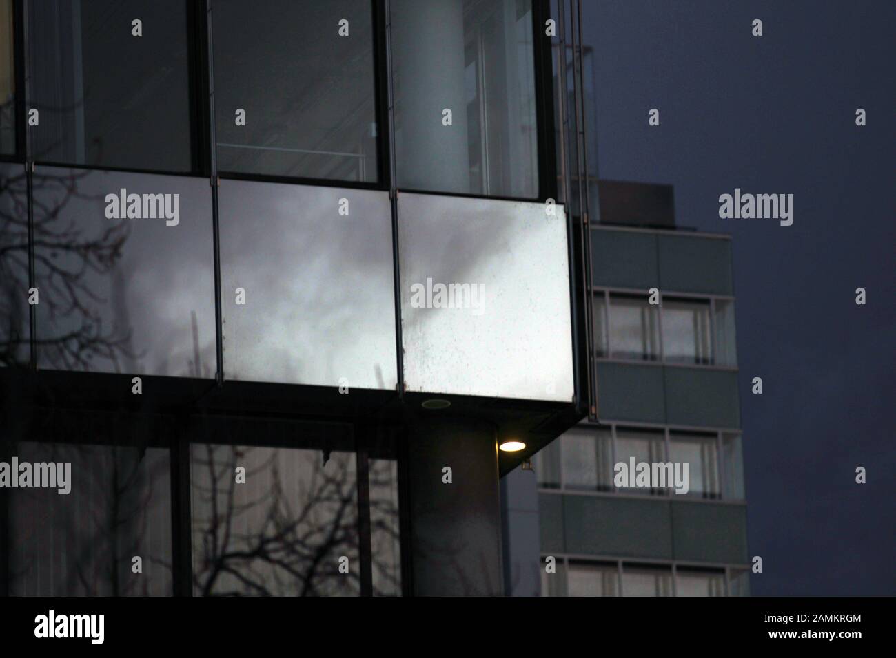 The glass facade of an office building in Arabella Park on the ...