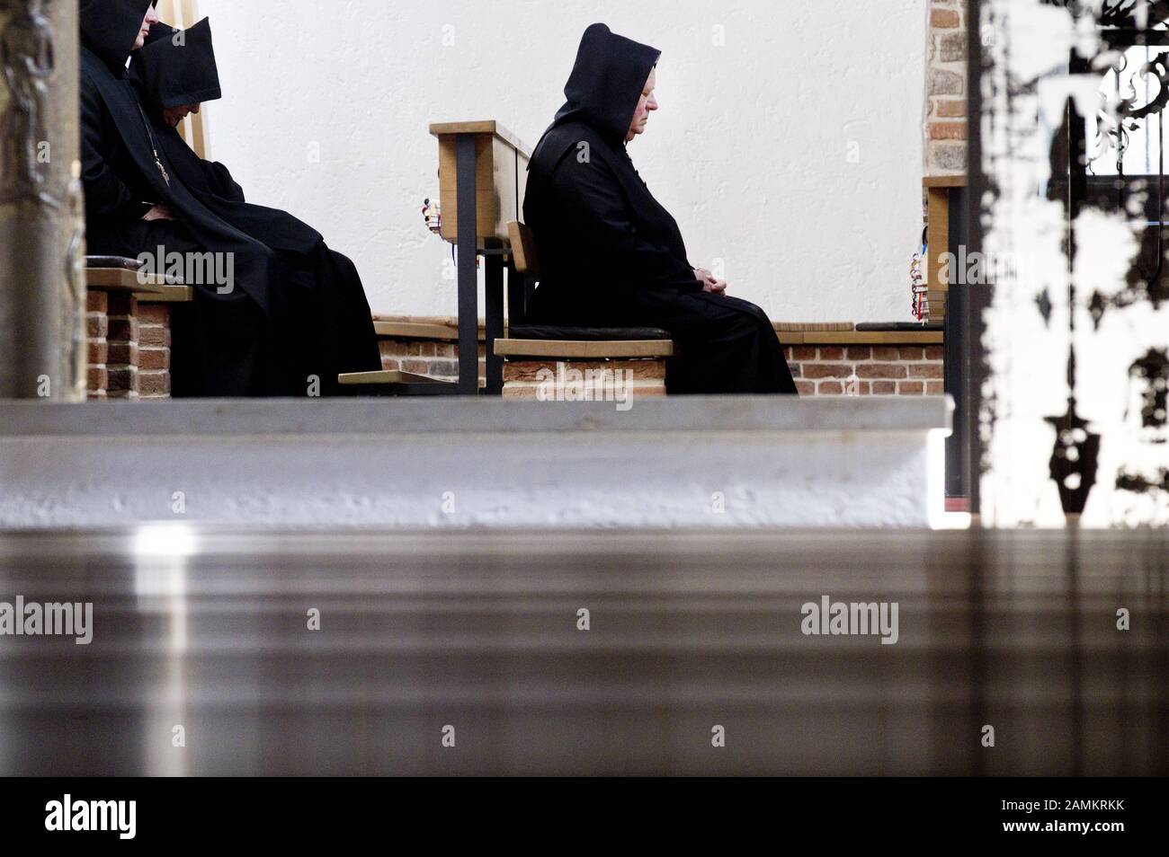 1000 years of Benedictine monks in Augsburg. Monks at prayer in the monastery church. [automated ...