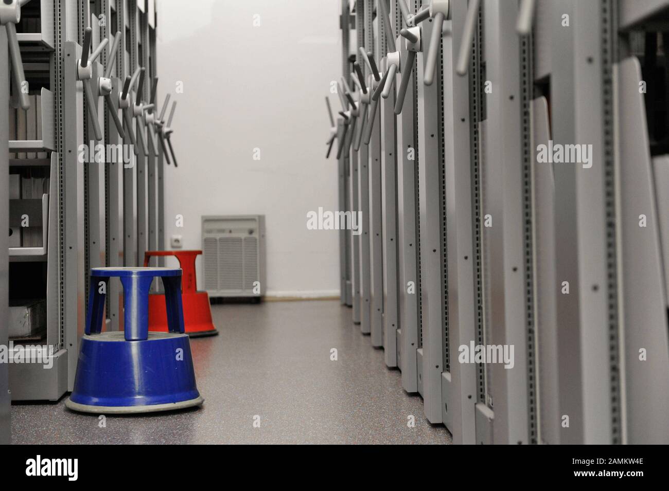 Sliding archive cabinets and step stools in the library of the State ...
