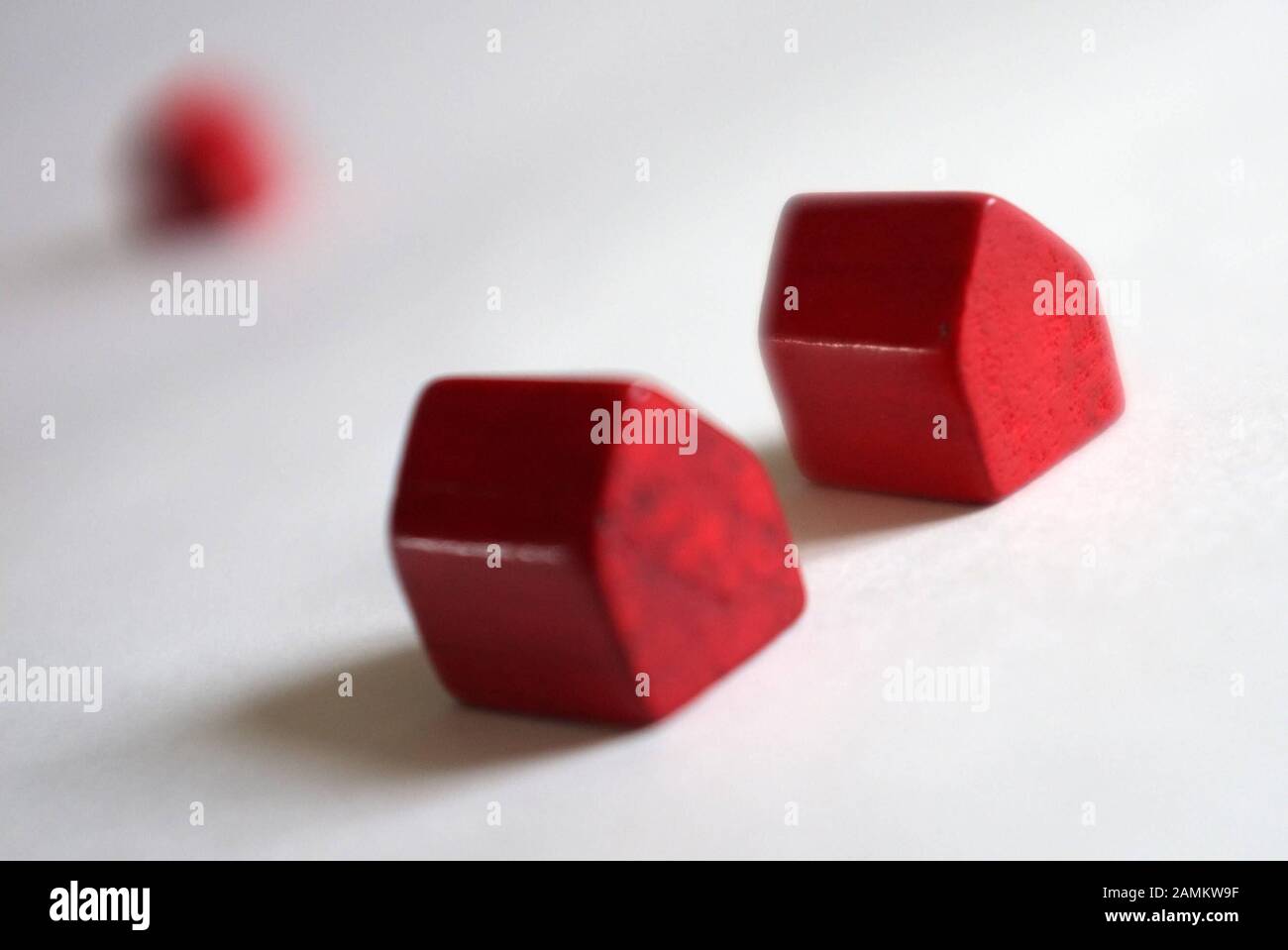 Red houses of a Monopoly game. [automated translation] Stock Photo - Alamy