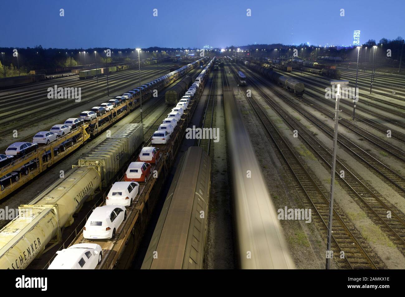 At the goods station in the north of Munich. Trains loaded with cars ...